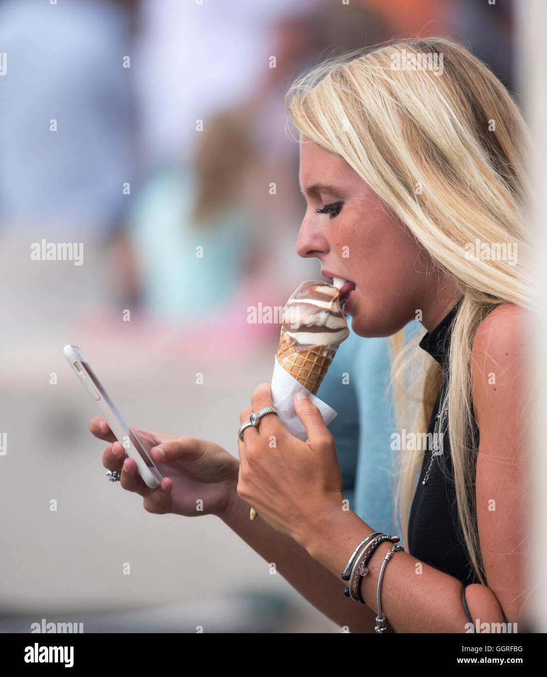 Licking ice cream hi-res stock photography and images - Alamy