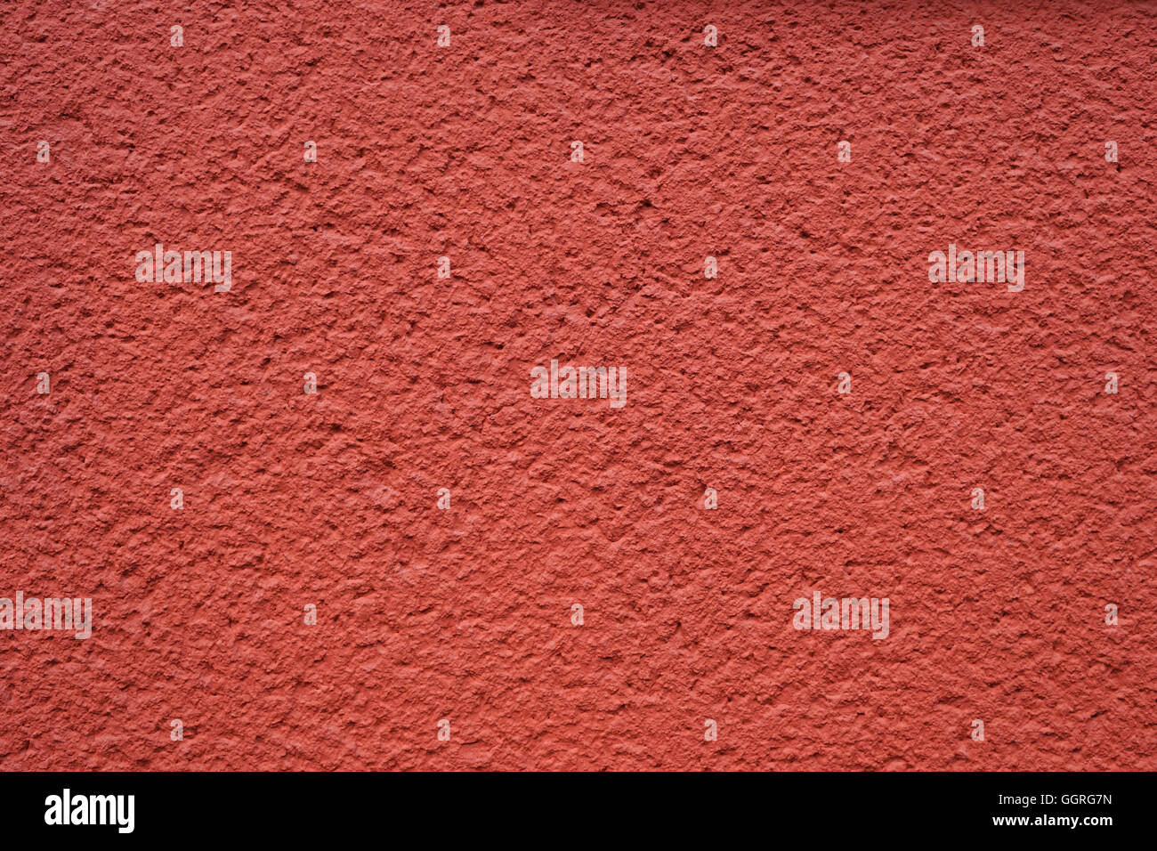 red roughcast background texture Stock Photo - Alamy