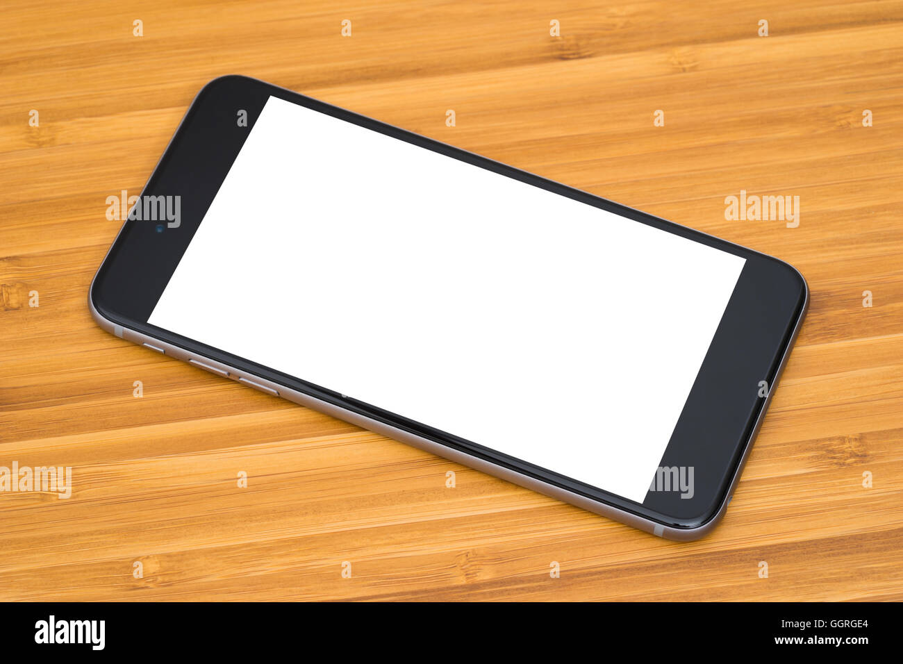 Smartphone on the desk, close-up Stock Photo - Alamy