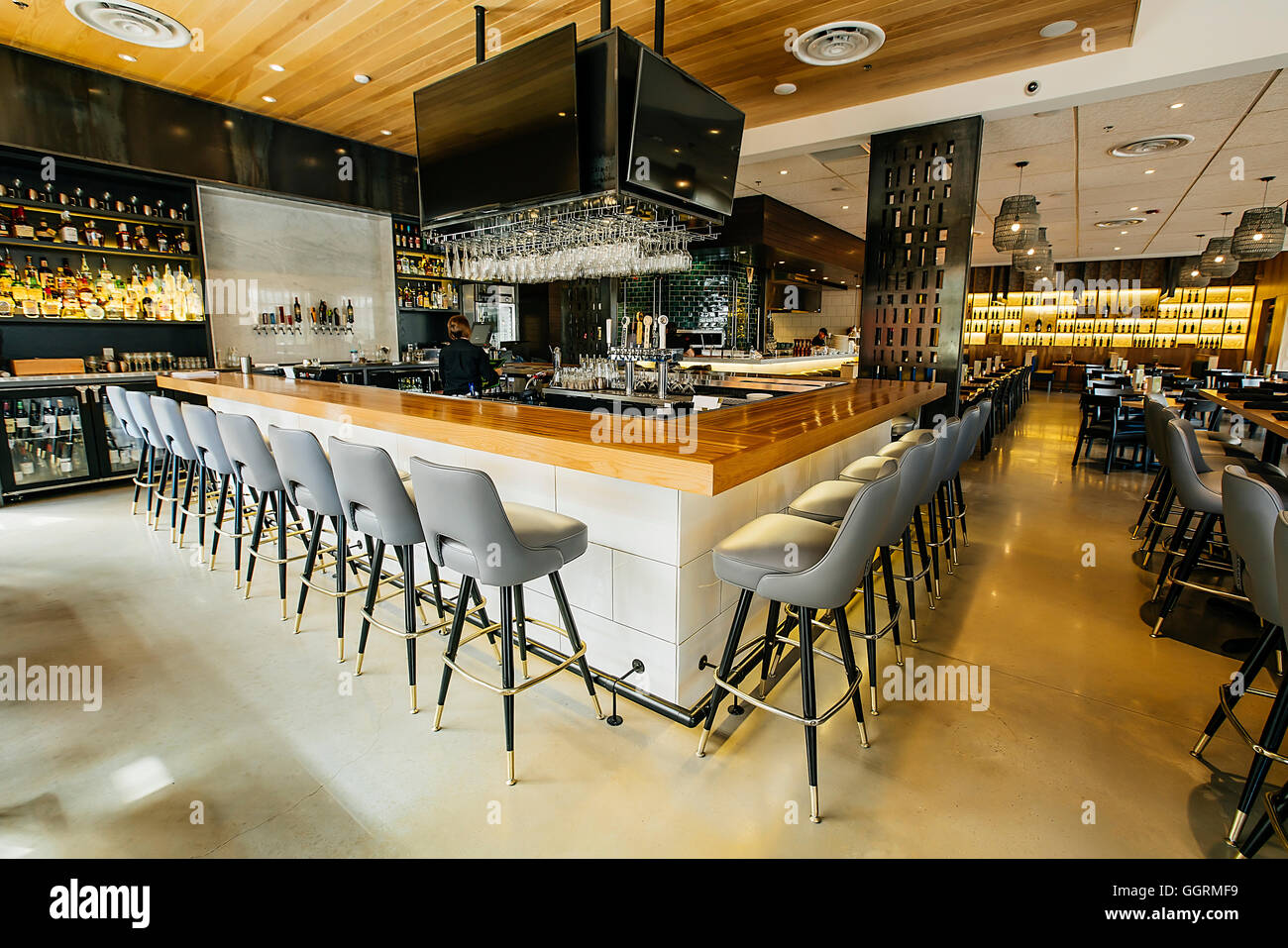 Tables and chairs in modern bar and restaurant Stock Photo - Alamy