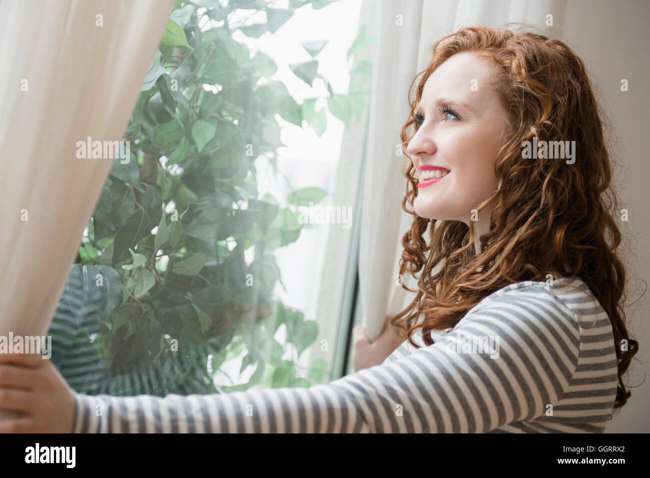 Person opening window hi-res stock photography and images - Alamy