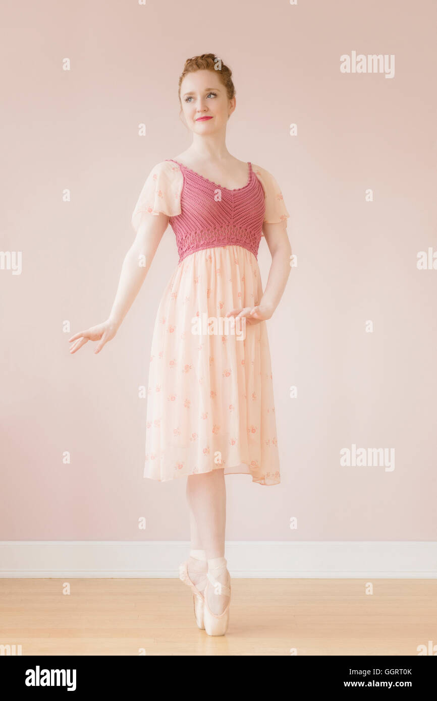 Caucasian ballerina standing en pointe Stock Photo - Alamy