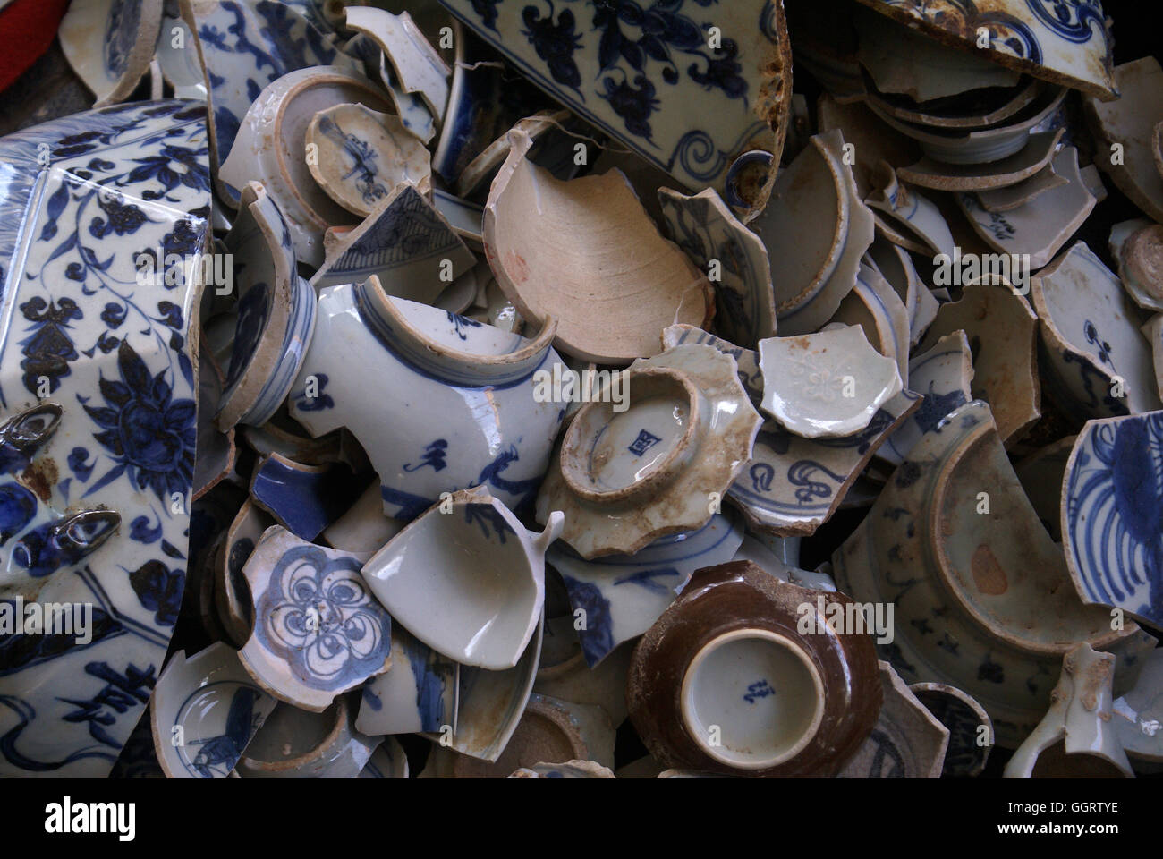 Broken antique china shards at the Panjiayuan Flea Market. Beijing ...
