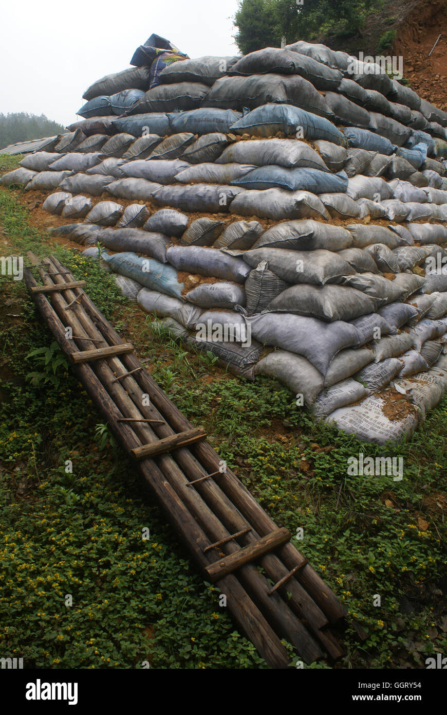 Sand bagged bunkers protecting black powder storage sheds at the Sunny ...