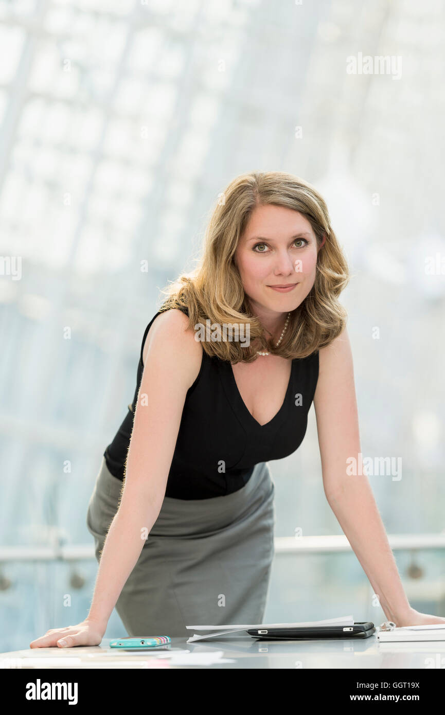 Leaning on table hi-res stock photography and images - Alamy