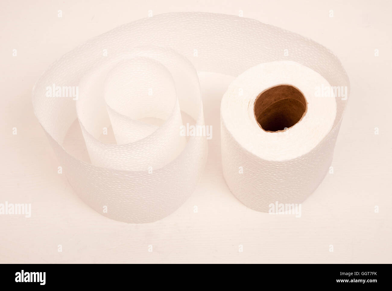 White toilet paper twisted into a spiral Stock Photo - Alamy