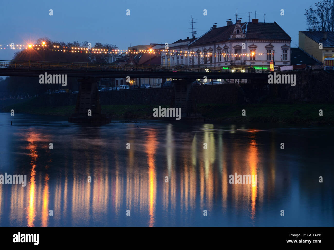Night view of pedestrian stone bridge over Uzh river, Uzhgorod,winter ...