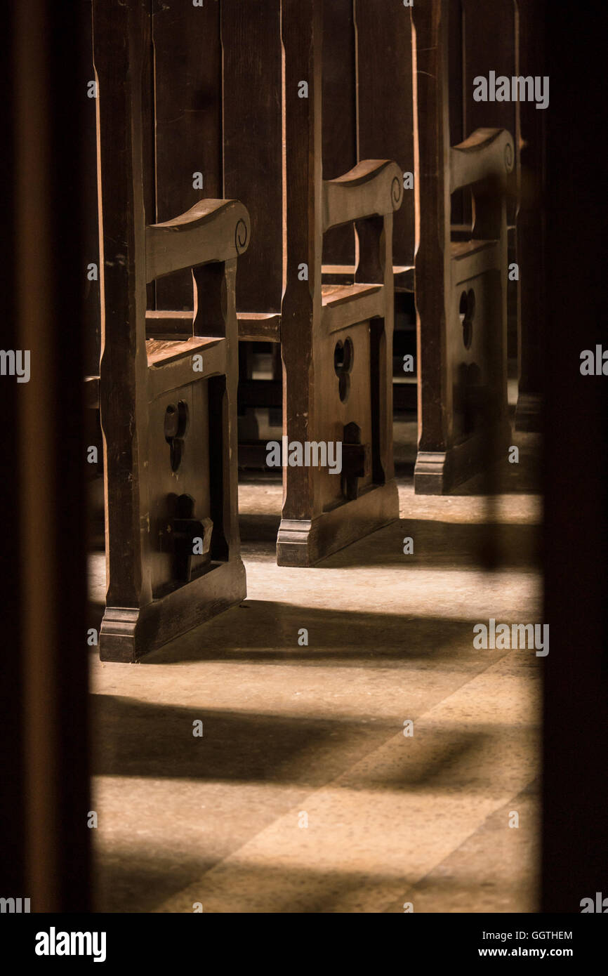 wooden bench in the Catholic Church in daytime Stock Photo - Alamy