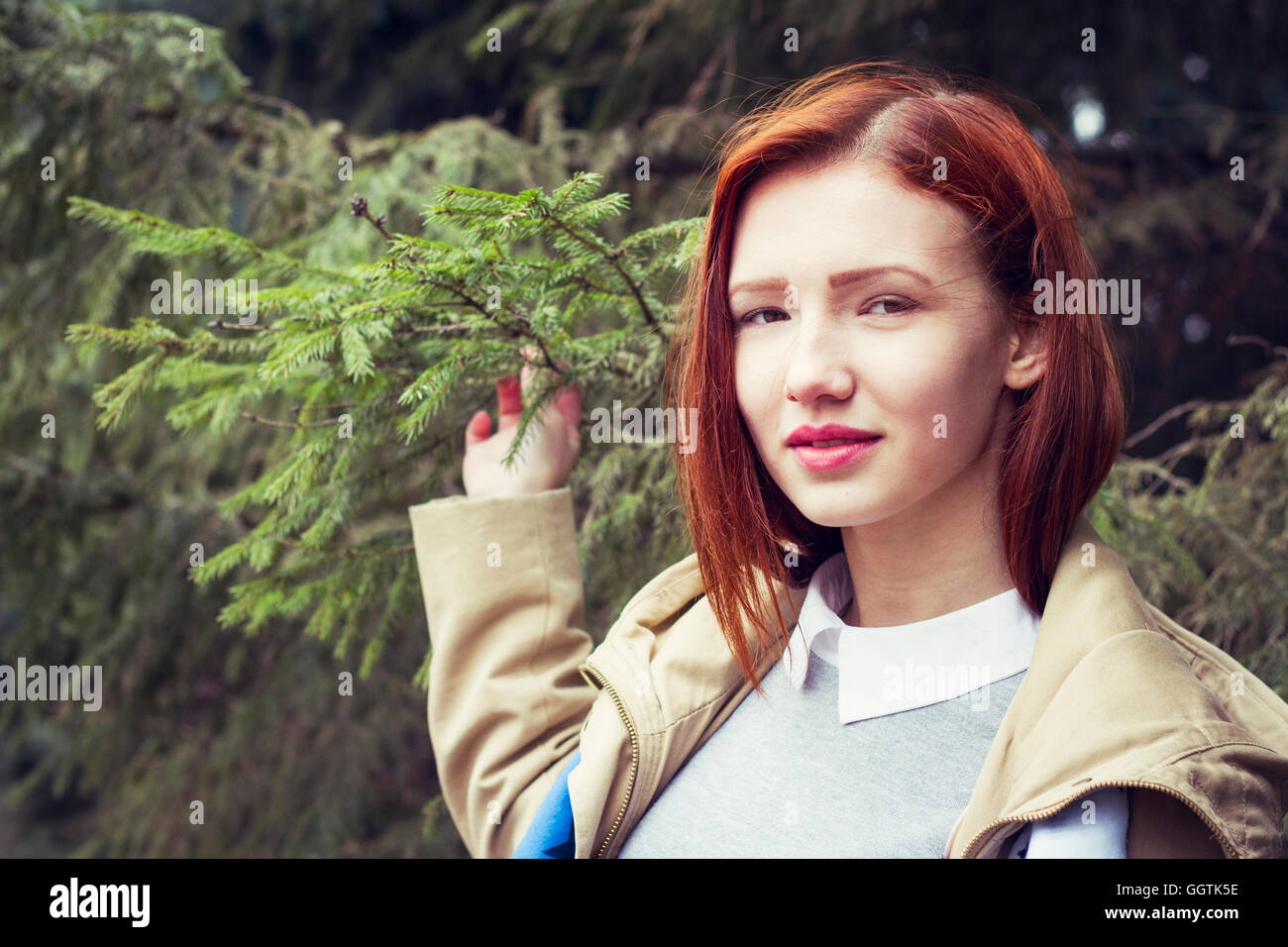 Young woman pine tree hi-res stock photography and images - Alamy