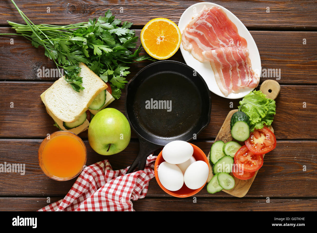 Traditional breakfast - eggs, bacon, toast and vegetables Stock Photo ...