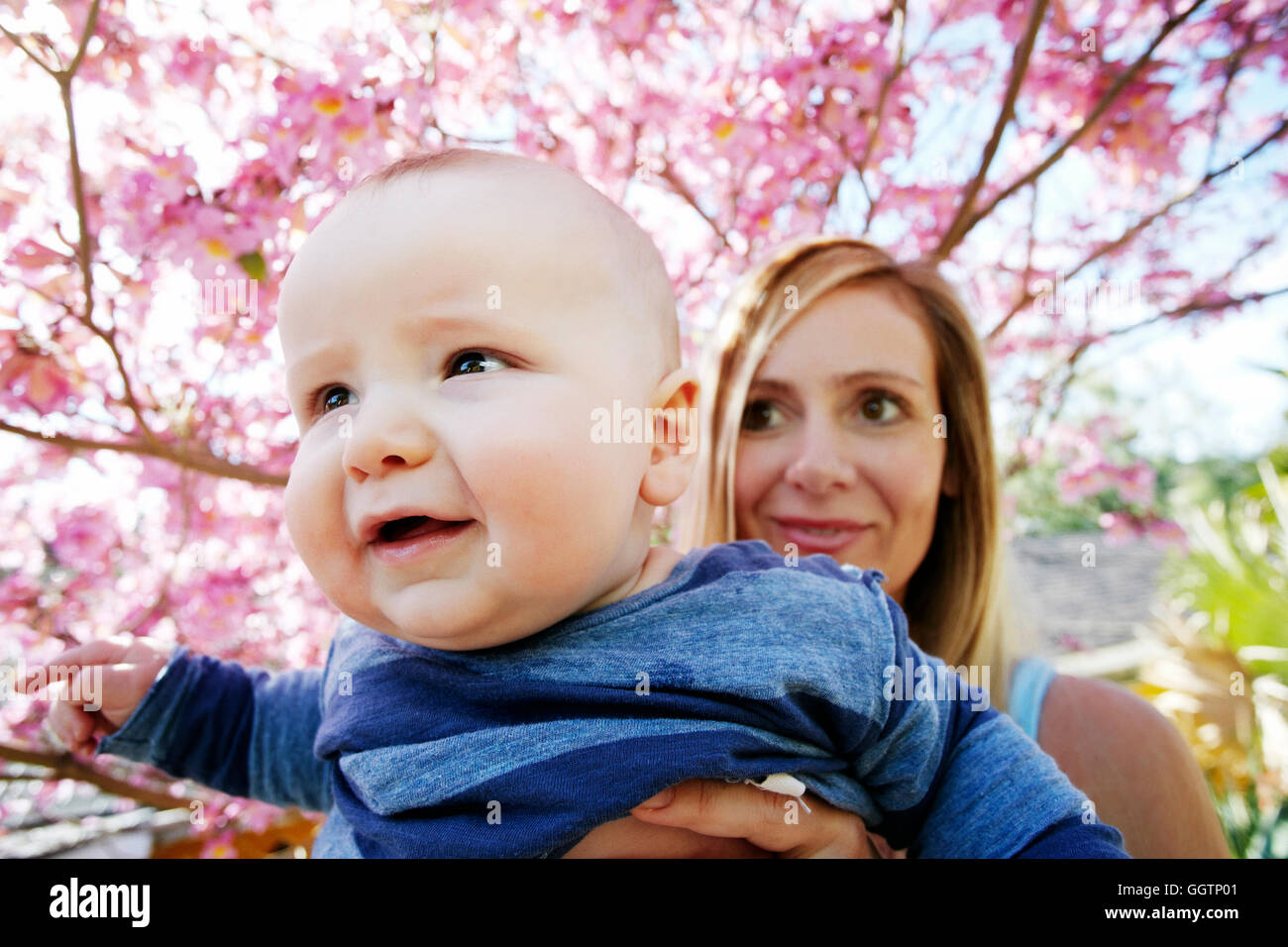 Baby with active mother hi-res stock photography and images - Alamy