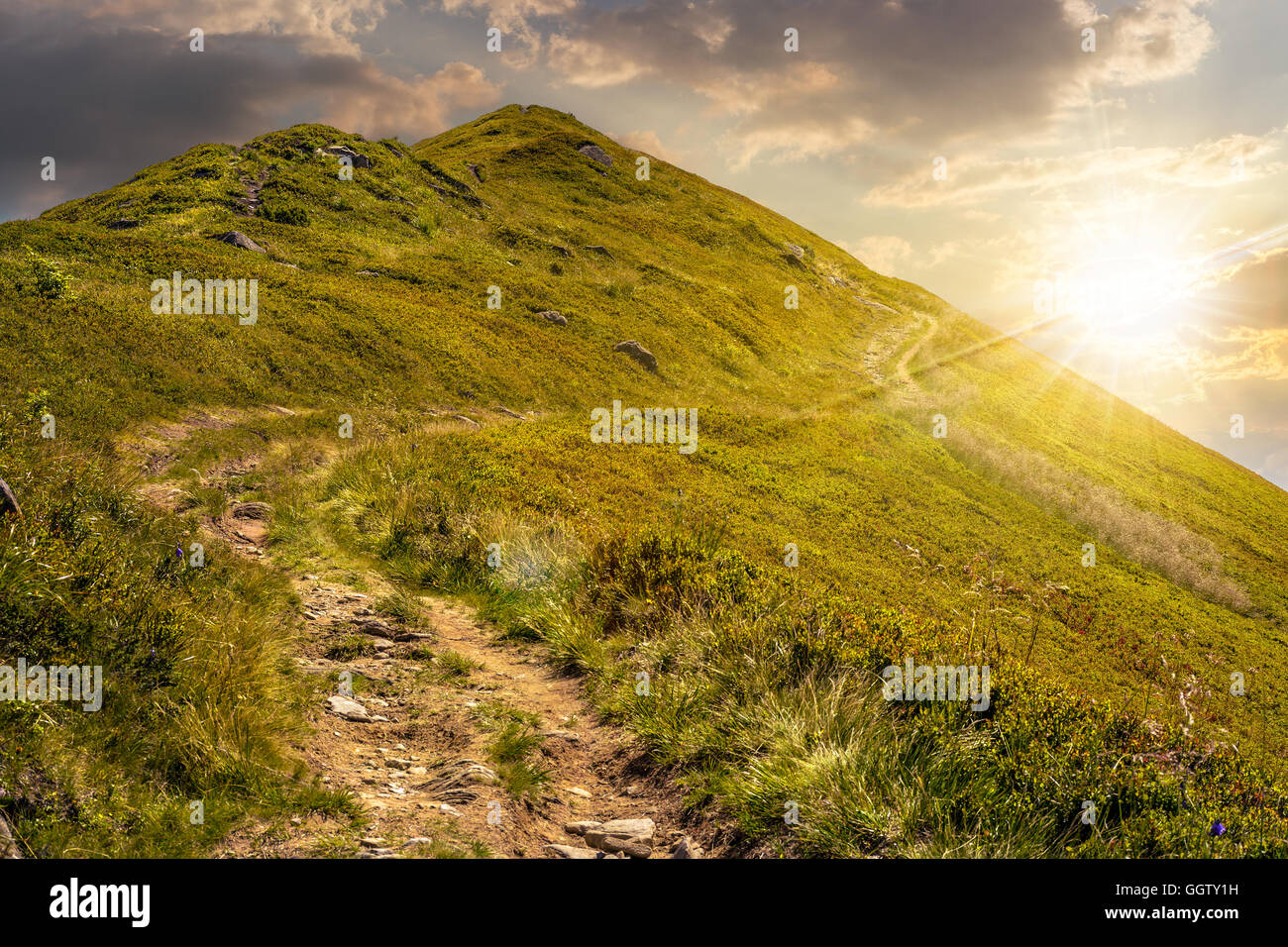 summer mountain landscape. foot path through hill side to the mountain ...