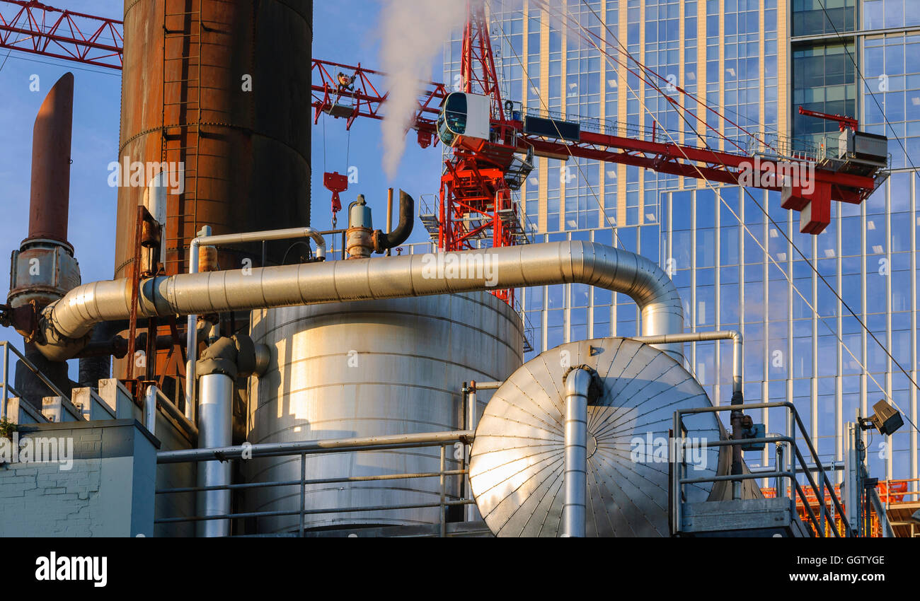 Steam from pipe near highrise Stock Photo - Alamy