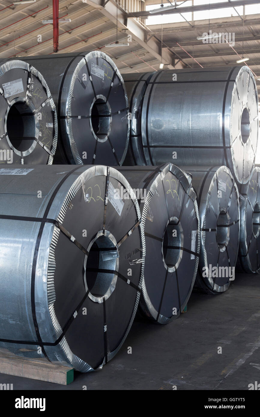 Metal rolls in warehouse Stock Photo - Alamy