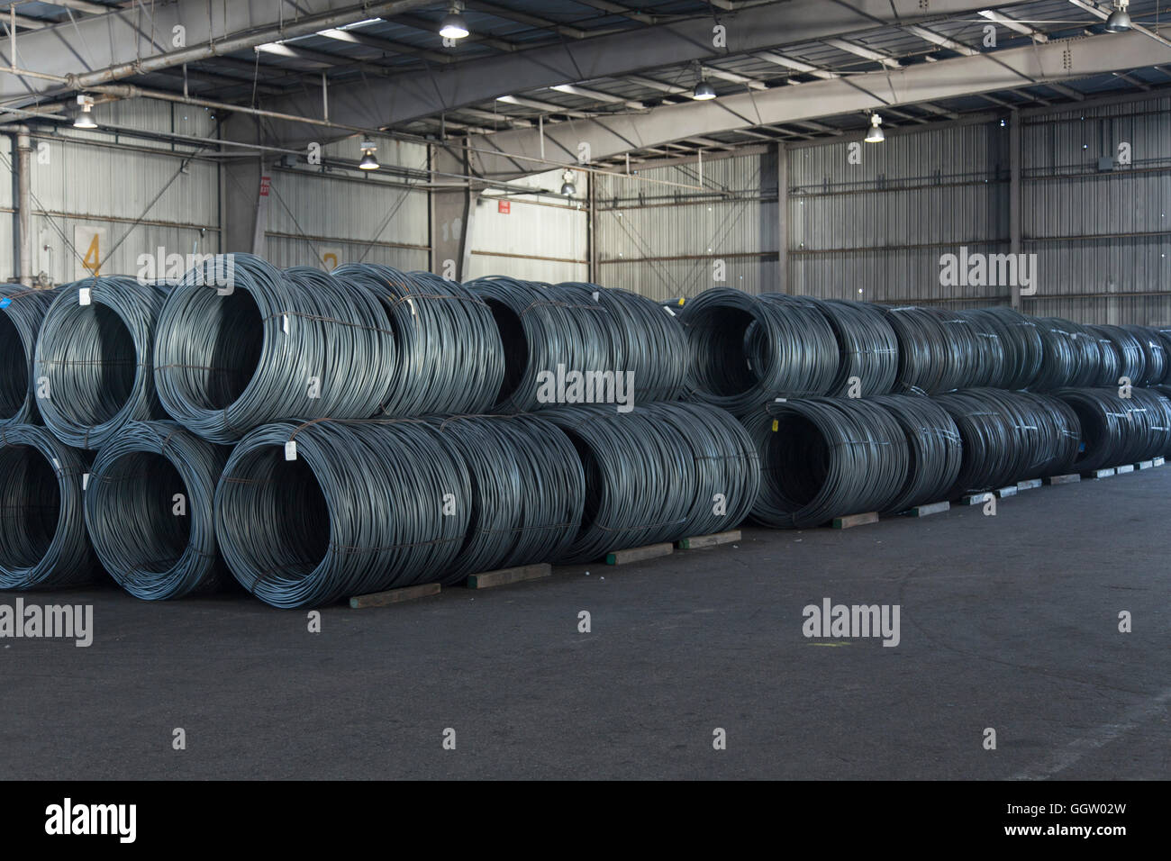 Rolls of wire in warehouse Stock Photo - Alamy