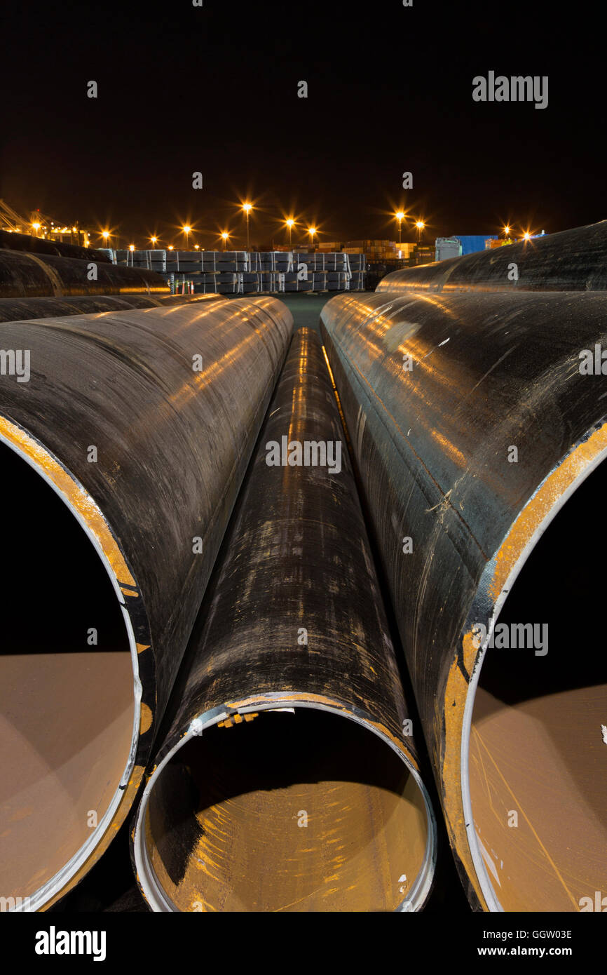 Pile of large pipes Stock Photo - Alamy