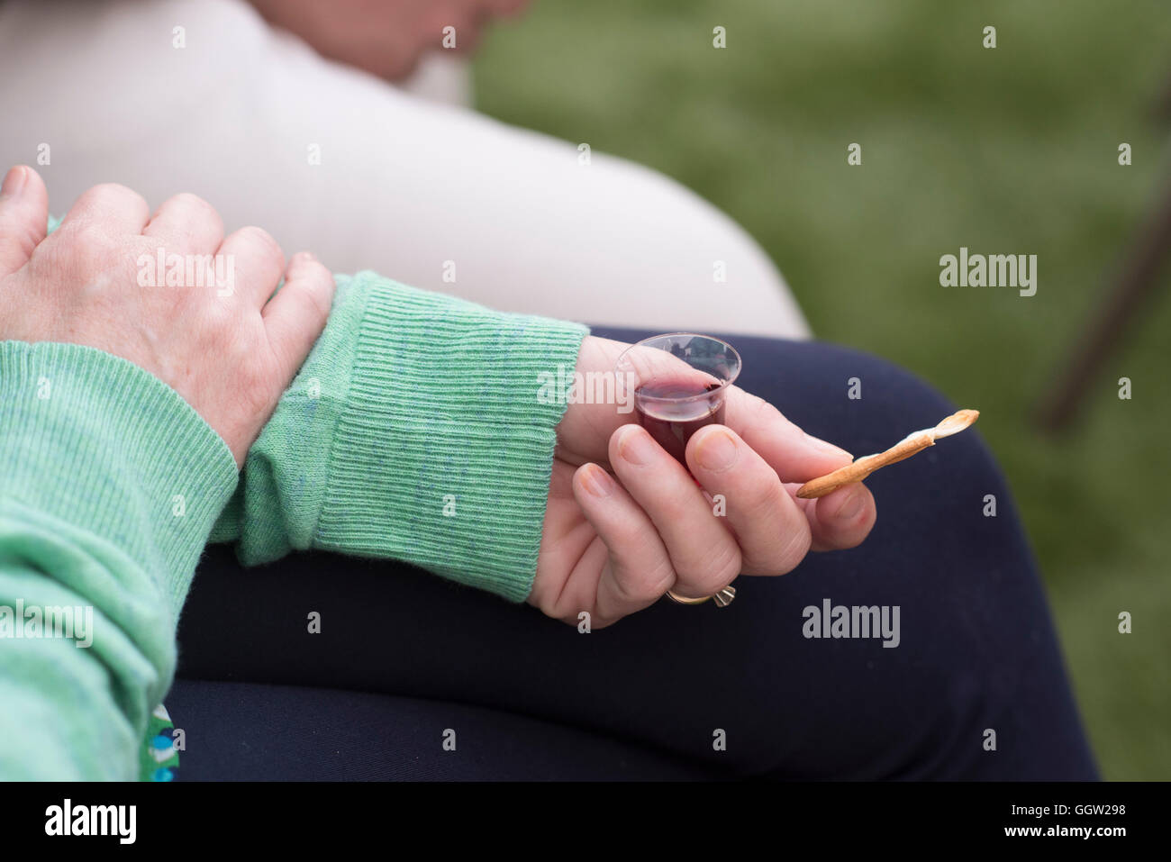 Holy Wafer. Holy communion in church. Taking holy Communion. Priest ...