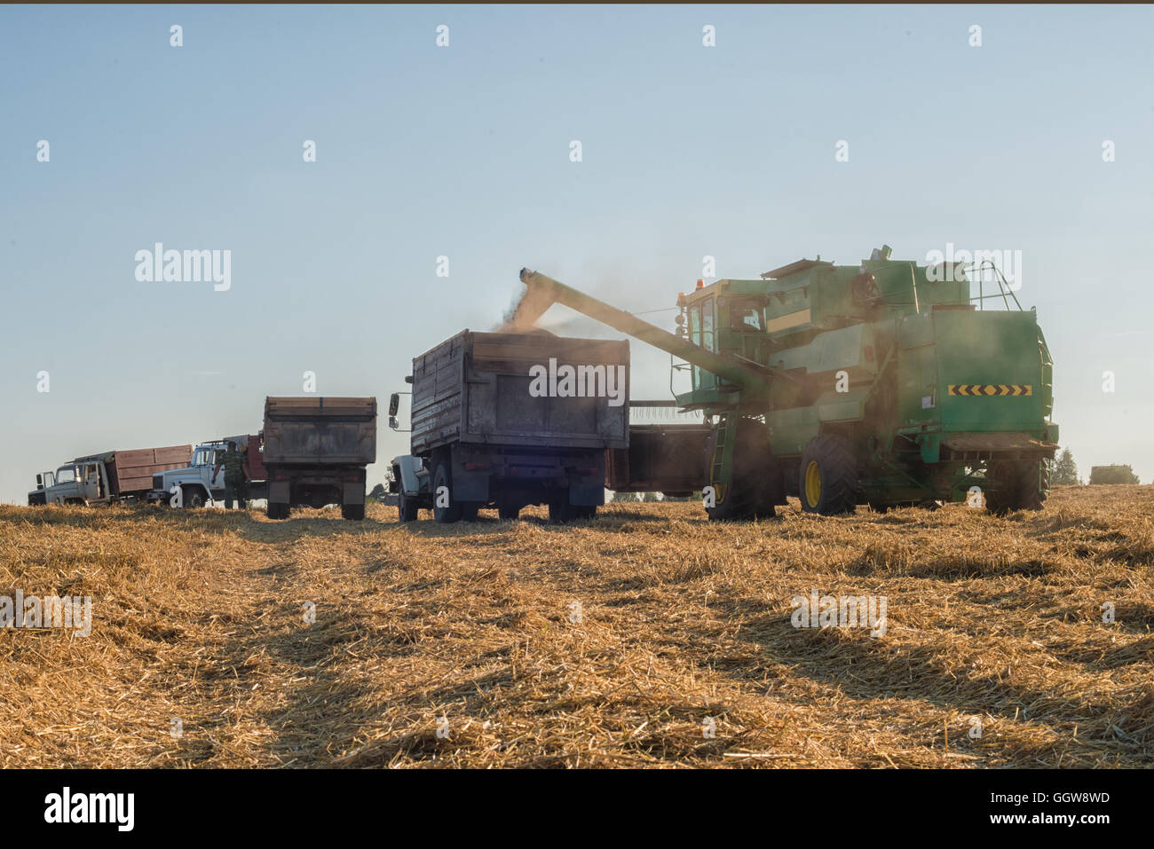 overload of grain harvesting machines in the cargo Stock Photo - Alamy