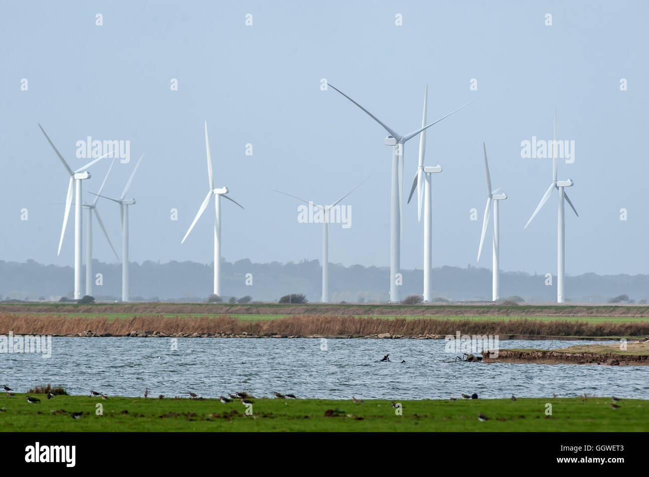Electricity pylons and wind turbines hi-res stock photography and ...
