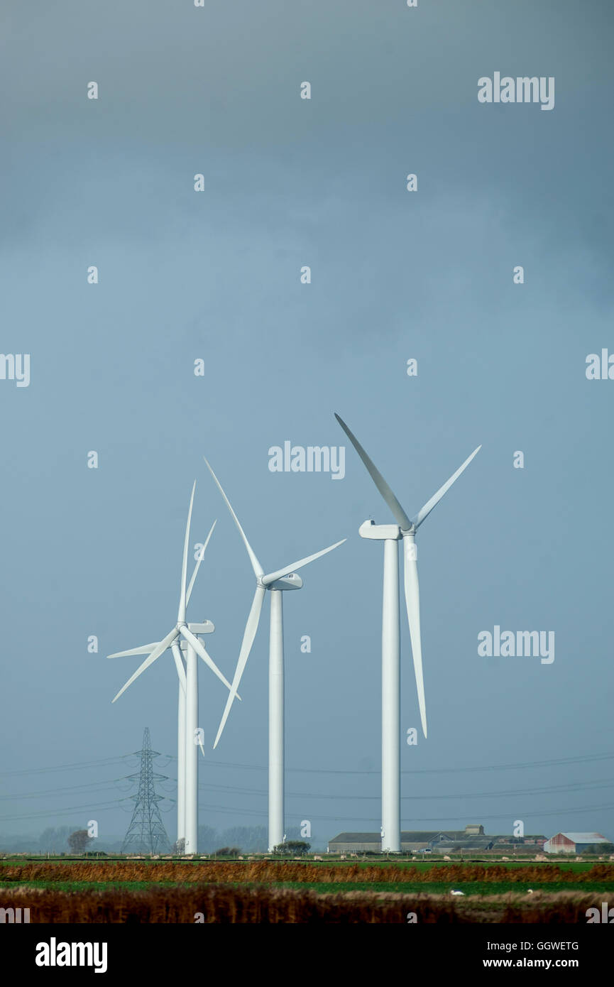 Power pylons and wind turbines in Kent Stock Photo - Alamy