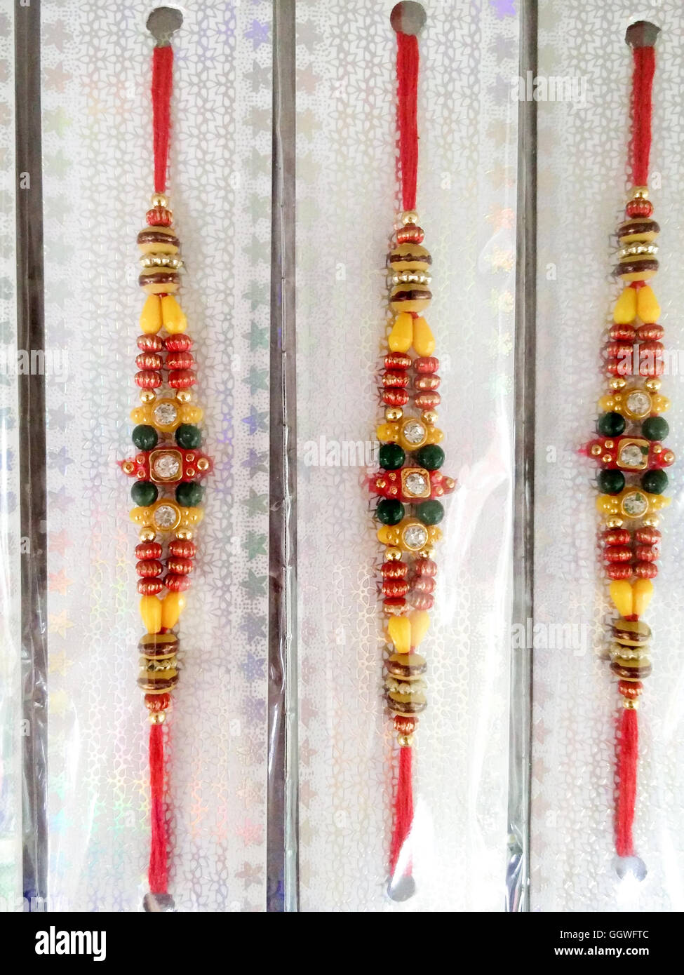 Indian rakhi threads packed for purchase Stock Photo - Alamy