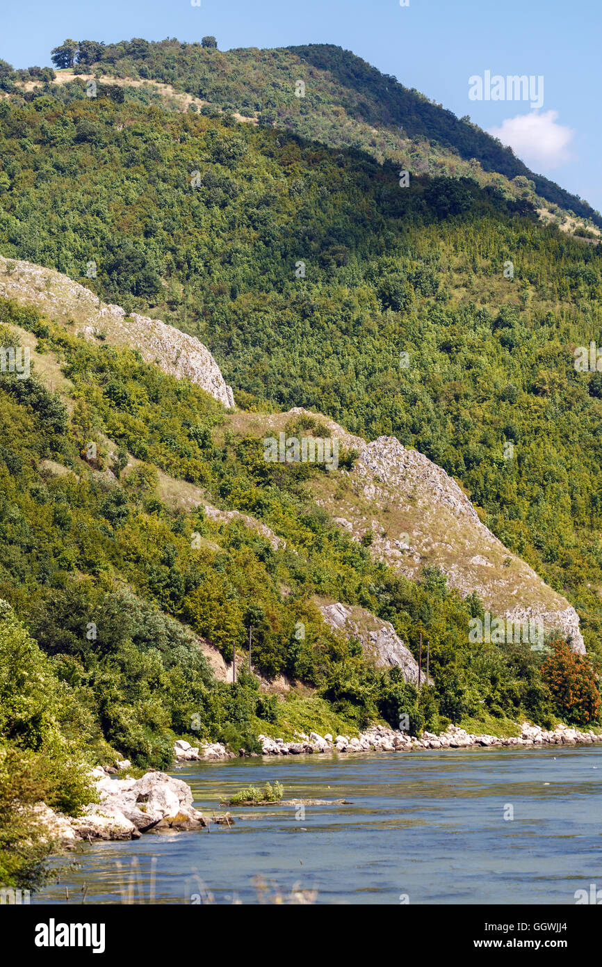 Landscape with the Danube river and surrounding limestone mountains in ...