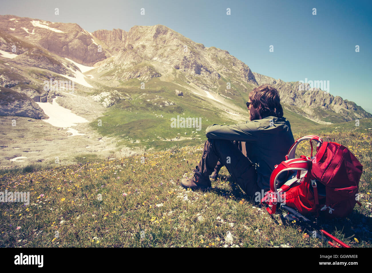Man Traveler with backpack relaxing outdoor Travel Lifestyle concept ...