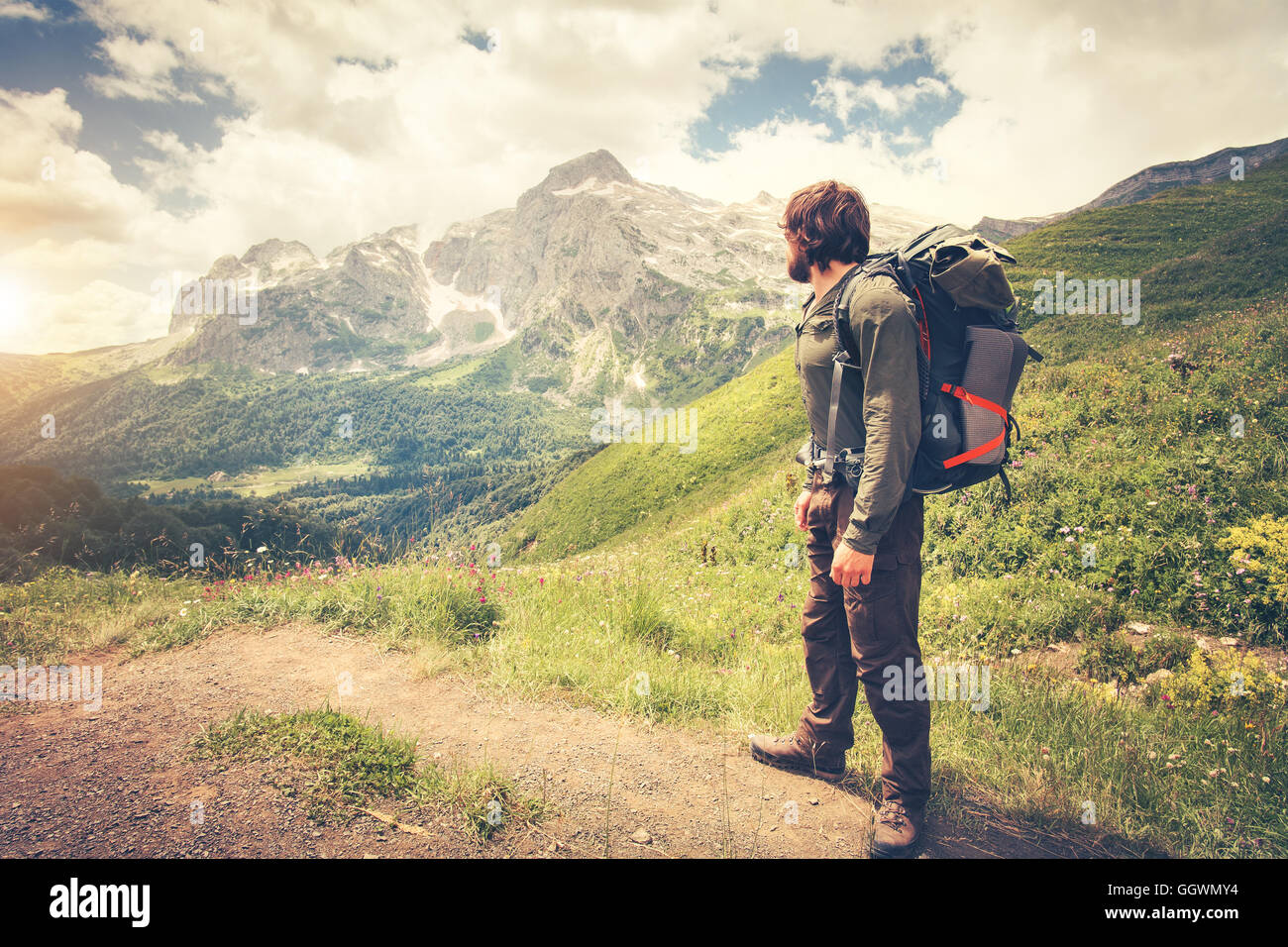 Traveler Man with backpack hiking Travel Lifestyle concept mountains on ...