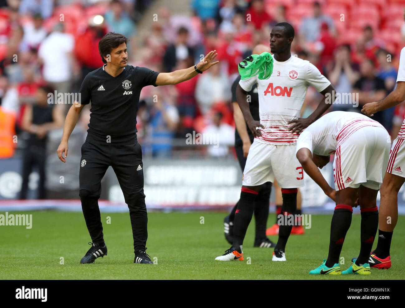 Manchester United assistant manager Rui Faria (left) during the warm up ...