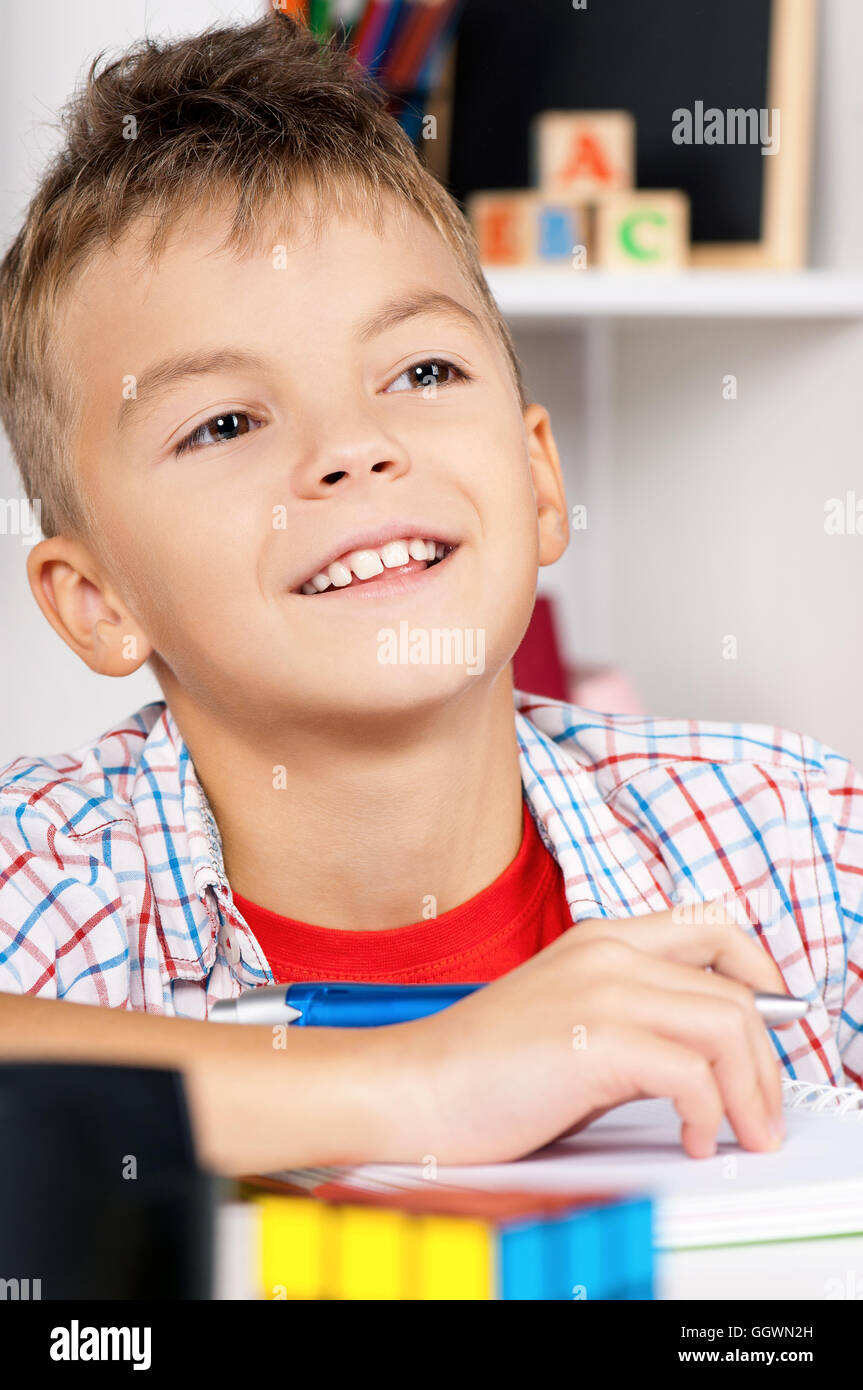 Boy homework at table Stock Photo - Alamy