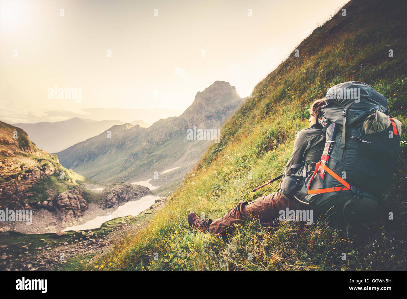 Man Traveler with big backpack relaxing alone Travel Lifestyle concept ...