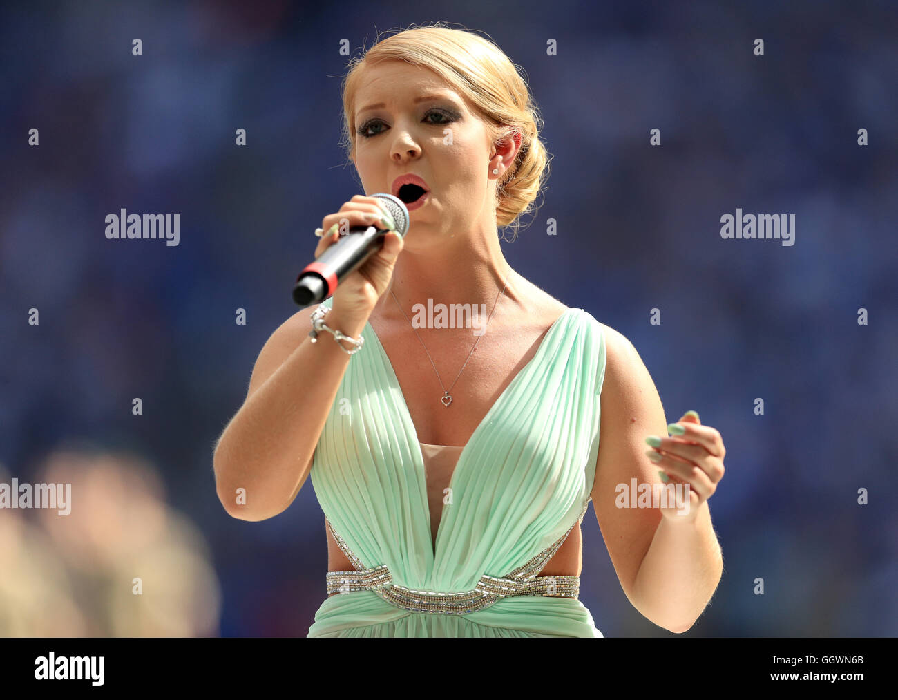 Emily Haig performs the national anthem during the Community Shield ...