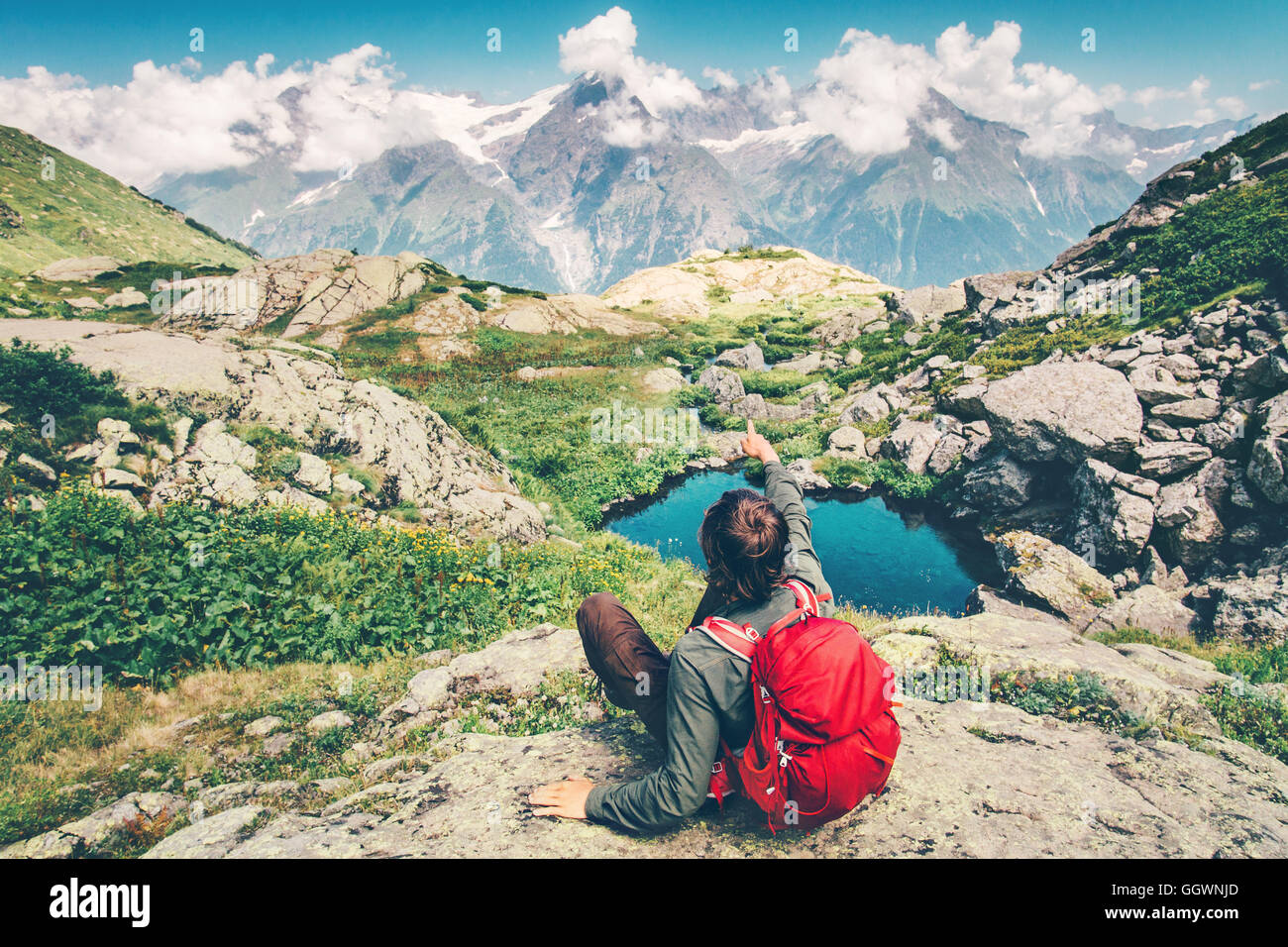 Traveler Man with backpack relaxing hand showing destination Travel ...
