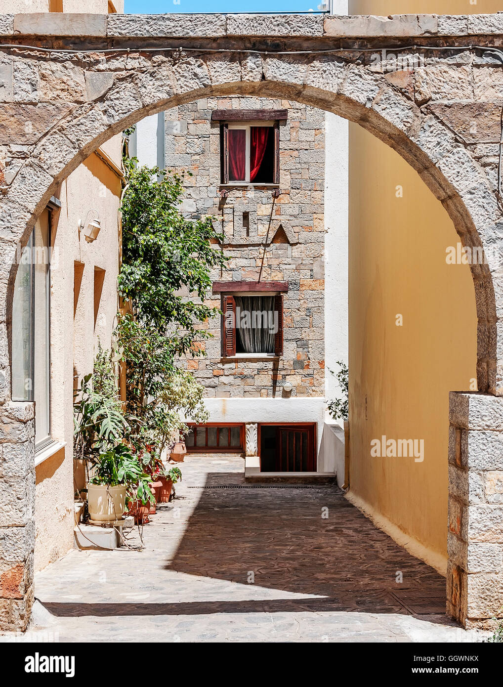 A street scene from the Greek town of Agios Nikolaos on the island of ...