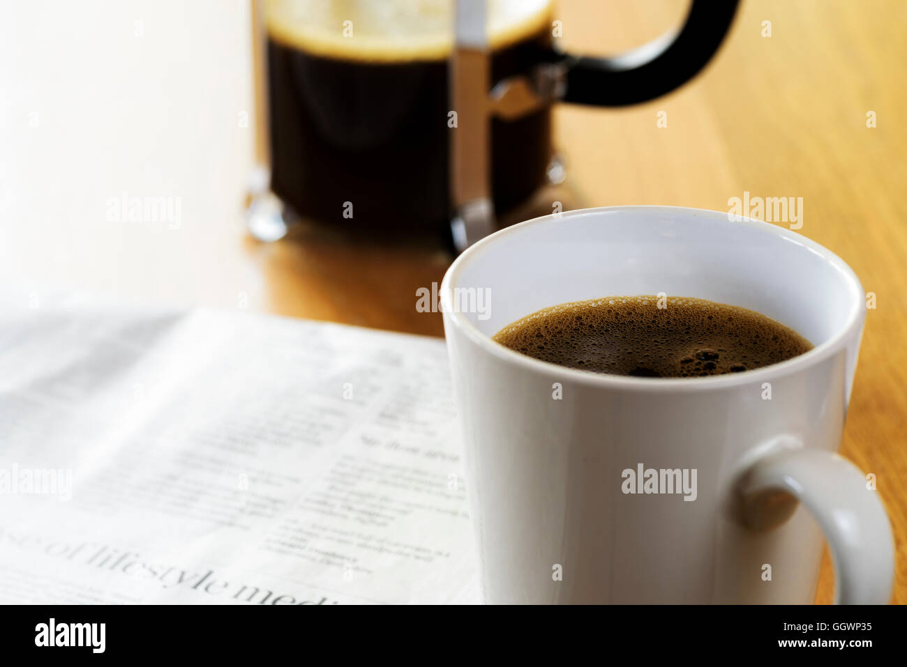 Morning coffee with newspaper Stock Photo - Alamy