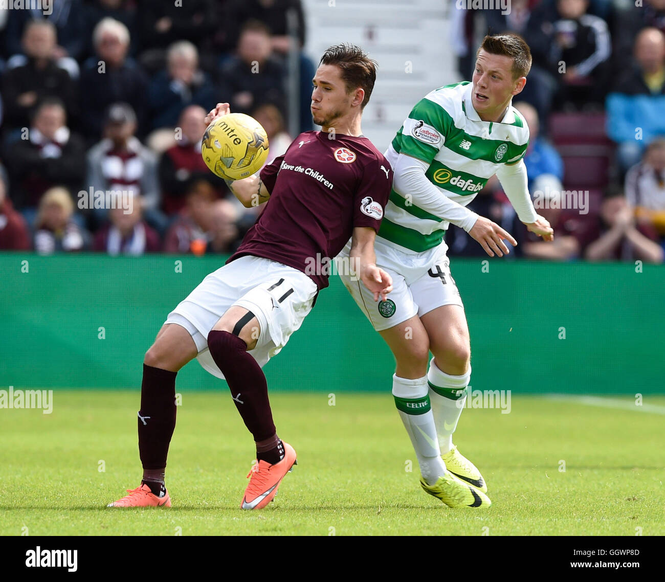 Hearts' Sam Nicholson and CelticÃ•s Callum McGregor battle for the ball ...