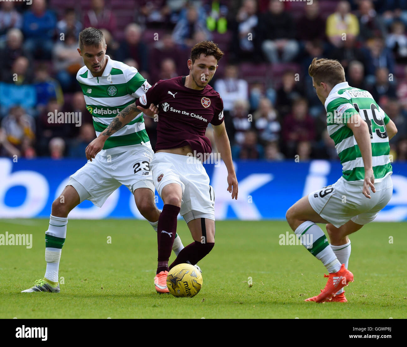 CelticÃ•s Mikael Lustig (left) and James Forrest (right) take on Hearts ...