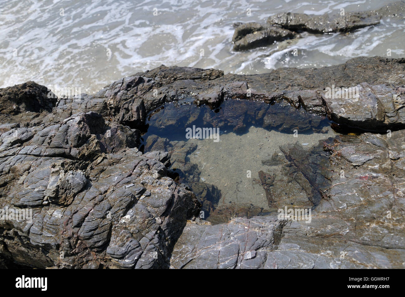 Small Pool of Water in Rocks on Beach of East Johor in Malaysia Stock ...