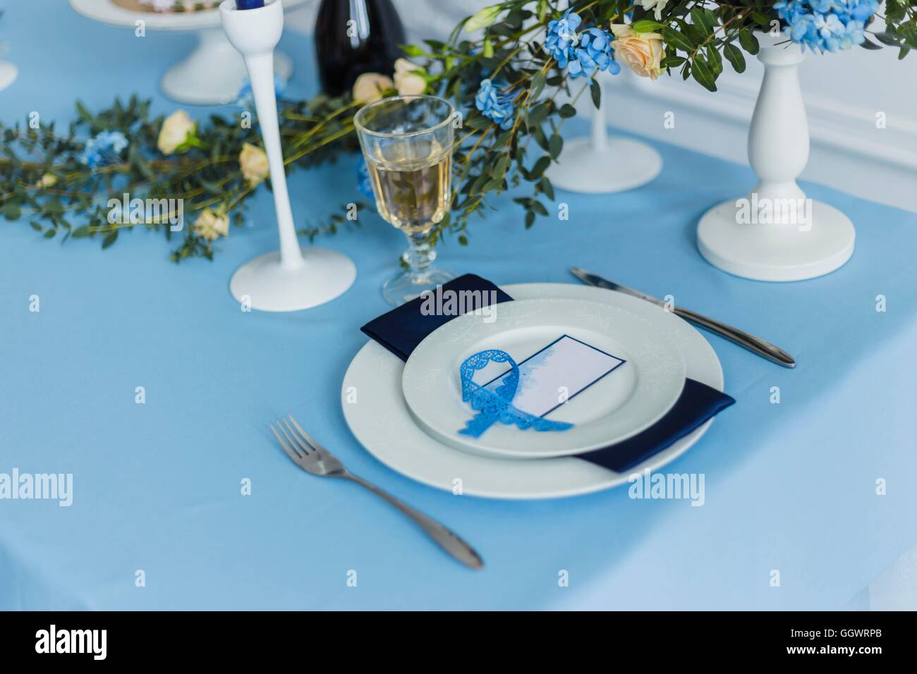 Decorated wedding banquet table with name card Stock Photo - Alamy