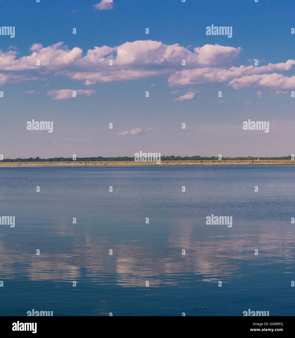 Relaxing water landscape with clouds reflections Stock Photo - Alamy
