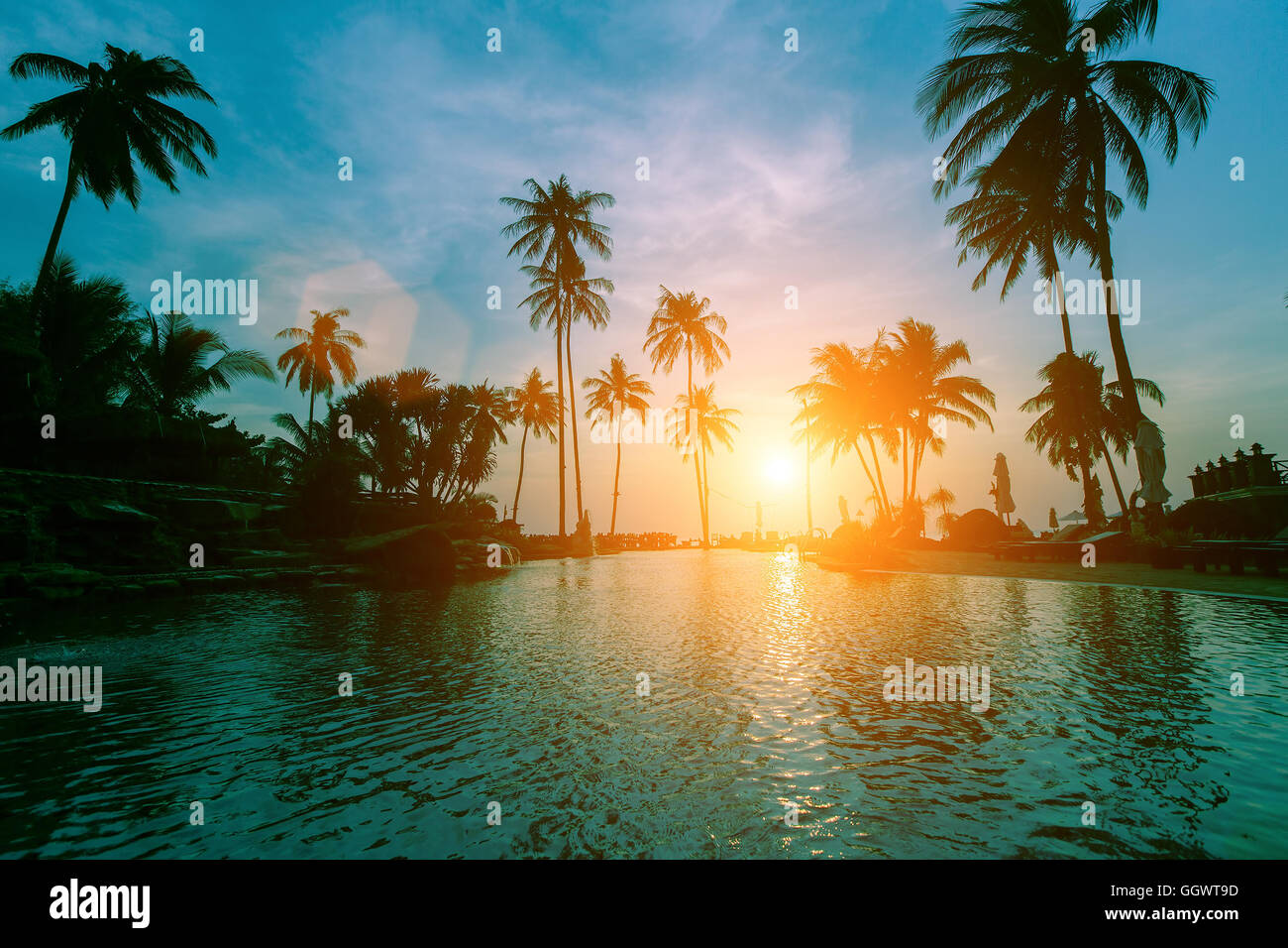 Surreal sunset on a tropical sea beach Stock Photo - Alamy