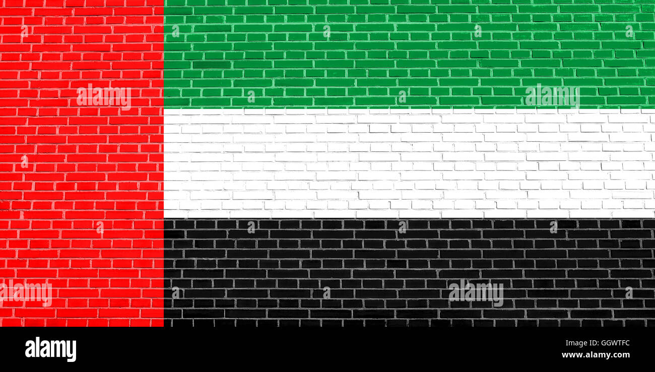 Flag of the United Arab Emirates on brick wall texture background. UAE ...