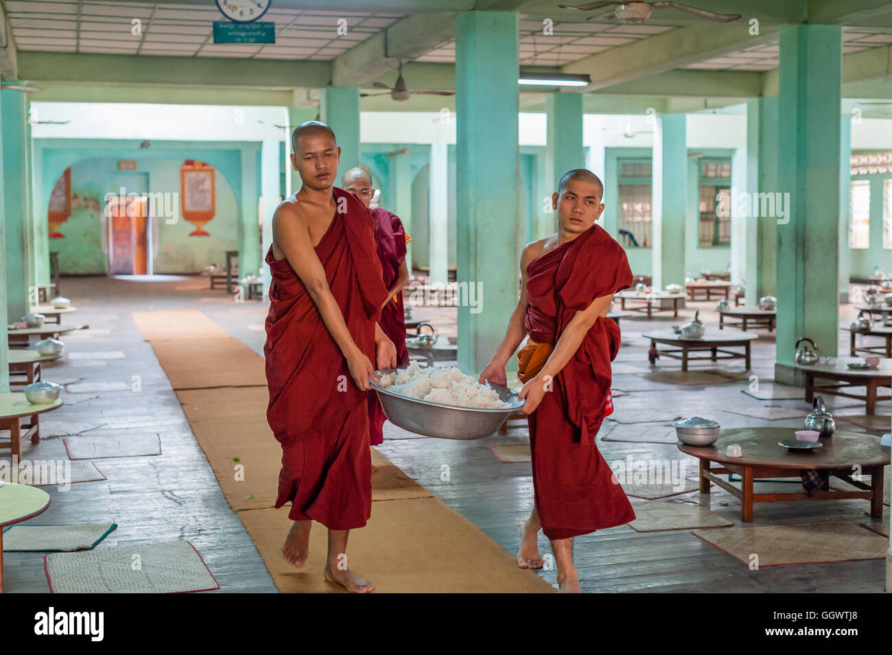 Buddhist Monks Carrying Rice Stock Photo - Alamy