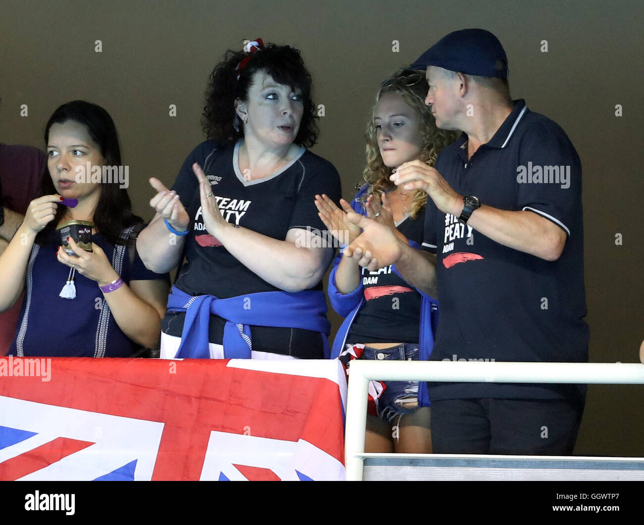 Mark and Caroline Peaty await the Men's 100m Final where their son will ...