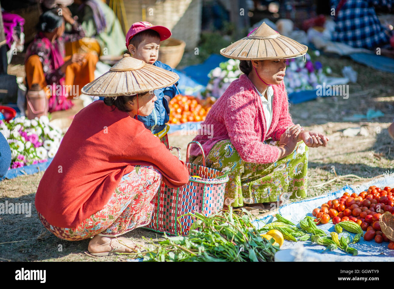 Burmese women at market Stock Photo - Alamy