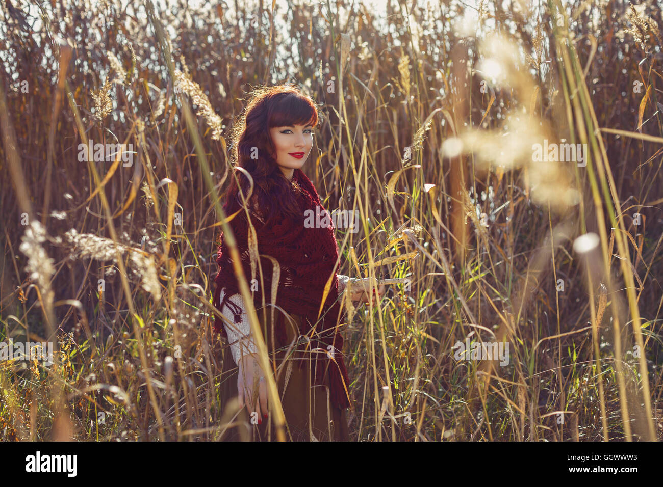 Beautiful girl outdoors in countryside Stock Photo - Alamy