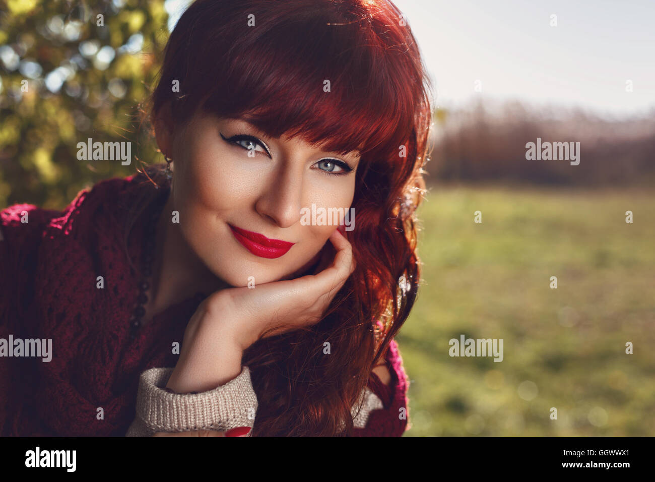 Beautiful girl outdoors in countryside Stock Photo - Alamy