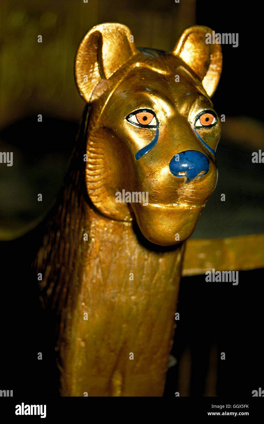 Tut Ankh Amon's tomb, a lion-headed gilded bedstead, on display at the ...