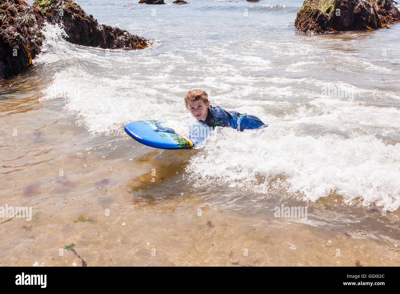 Child bodyboard hi-res stock photography and images - Alamy