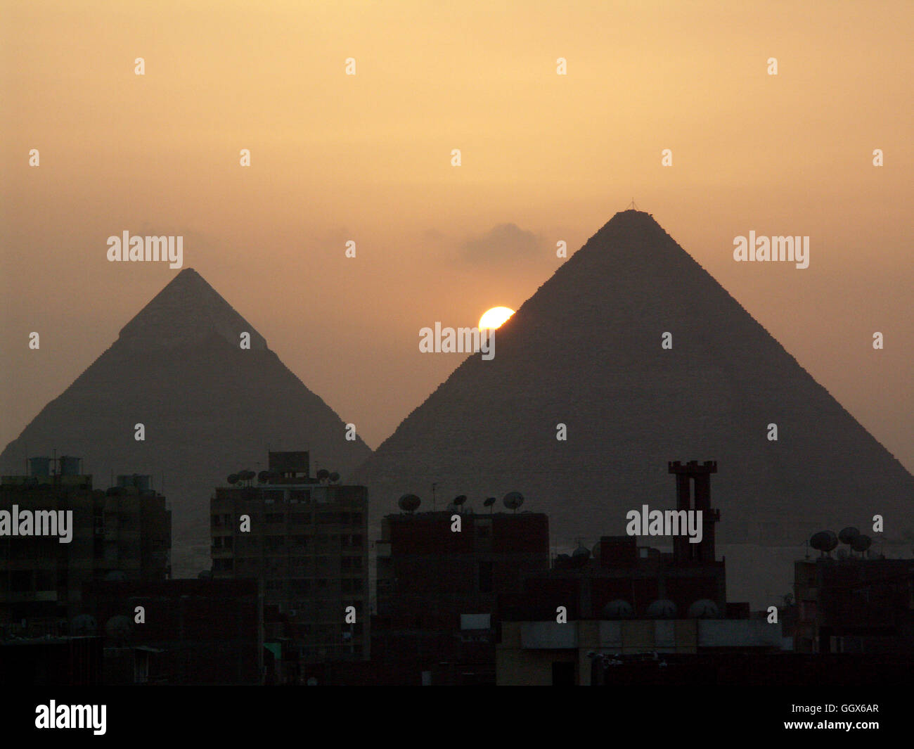 The Great Pyramids at sunset on the Giza Plateau. Egypt Stock Photo - Alamy